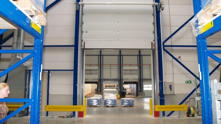 A liquid retention barrier with a firedoor - Protec Industrial Doors
