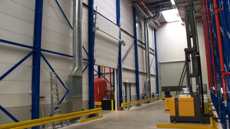 A liquid retention barrier with a firedoor - Protec Industrial Doors